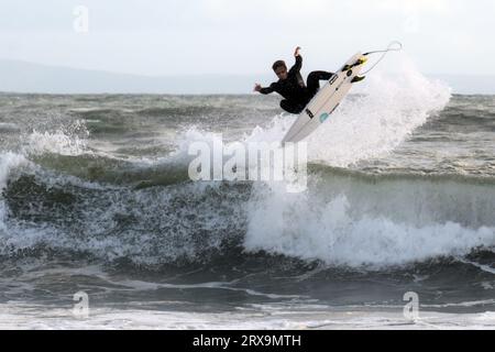 Top surfer Patrick Langdon-Dark runs across the beach to the surf ...