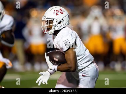 UNLV running back Vincent Davis Jr. warms up before an NCAA college ...