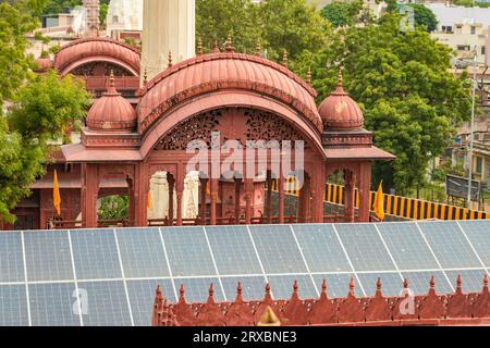 ancient holy jain trample entrance with cloudy sky and mountain ...