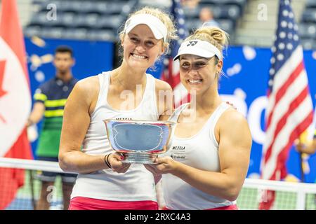 Gabriela Dabrowski and Erin Routliffe in action during a women's doubles semifinal match at the ...