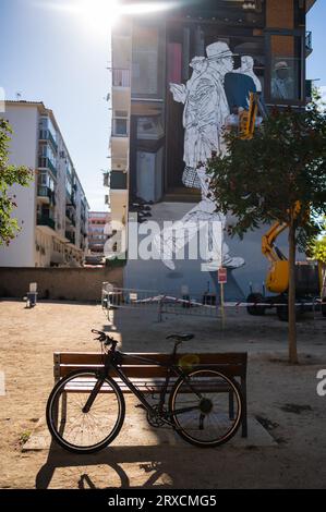 French artist Taroe working at Asalto International Urban Art Festival ...