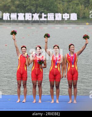 Gold medalists Chen Yunxia, Zhang Ling, Lyu Yang and Cui Xiaotong of China pose for the media ...