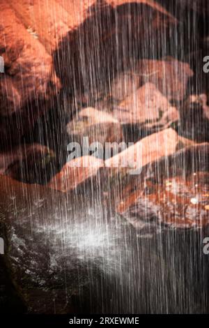 Rain drops falling on a rock Stock Photo - Alamy