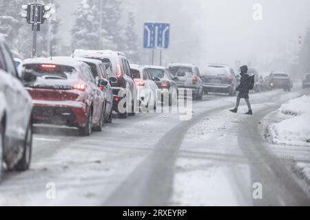 Traffic jam, bad weather, heavy traffic during heavy snowfall and rain ...
