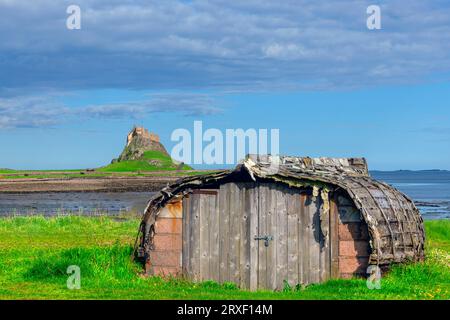 The tidal island of Llindisfarne, also called Holy Island, in ...