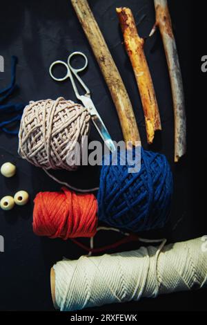 Tools for weaving in macrame technique. Cotton cords, scissors ...