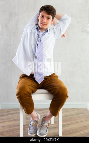 Physical jerks for office workers on chair Stock Photo - Alamy