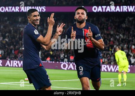 Goncalo Ramos, Achraf Hakimi of PSG celebrate the victory following the penalty shootout of the ...