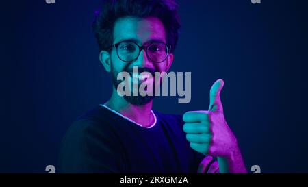 Ultraviolet neon background Arabian man hi-tech internet technology ...
