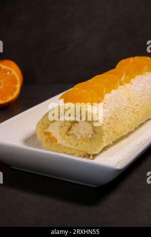 Delicious citrus cake on wooden background Stock Photo - Alamy