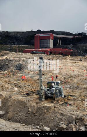 Drilling machine preparing for a blasting session at an open cast coal ...