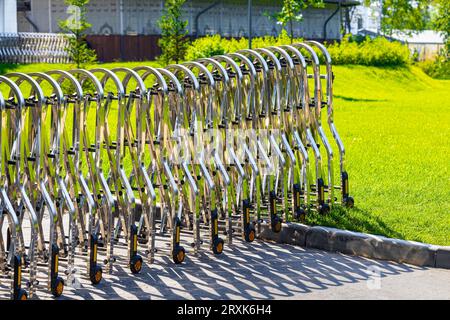 movable metal railing on wheels on the street Stock Photo - Alamy