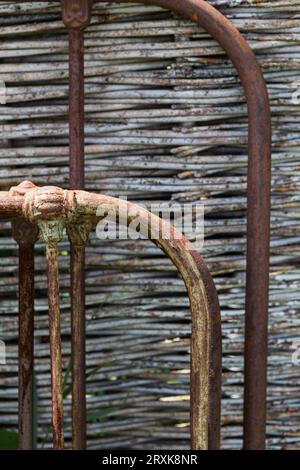 Old, rusty vintage bed headboard Stock Photo - Alamy