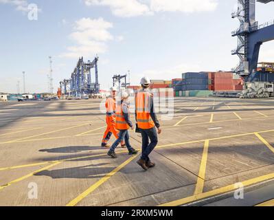 Dock workers walking at Port of Felixstowe, England Stock Photo - Alamy