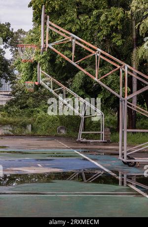 Two basketball wooden backboards with the hoop metal rings and the ...