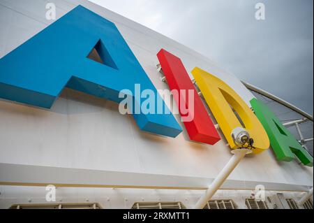 Colorful AIDA Logo attached to a AIDA Cruise ship during cloudy sky ...