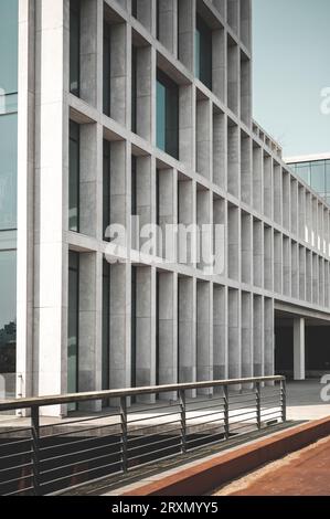 A vertical shot of modern buildings near the mountains in Espera, Spain ...