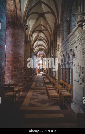 A vertical shot of a corridor of a cathedral Stock Photo - Alamy