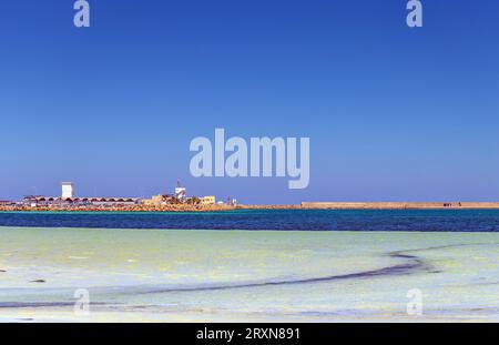 Fishing Port on Two-Tone Beach Stock Photo - Alamy