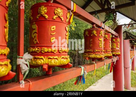 Rotating religious elements for touching turning spinning Buddhist ...