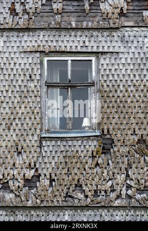 Dilapidated historic dwelling house, run-down, dilapidated, window with ...
