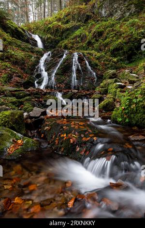 Waterfall in autumn forest, Holchen waterfall, Bad Peterstal-Griesbach ...
