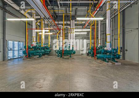 Compressor room in ammonia-cycle industrial refrigeration cold-storage ...