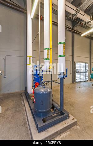 Compressor room in ammonia-cycle industrial refrigeration cold-storage ...