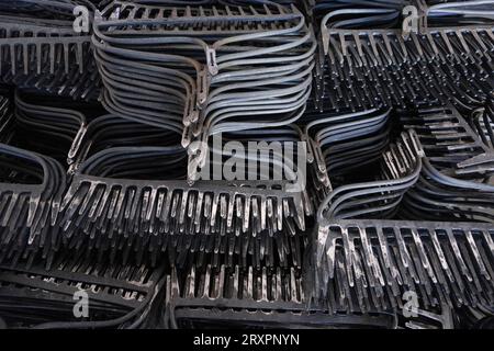 The semi-finished products of the nail rake are stacked together Stock ...