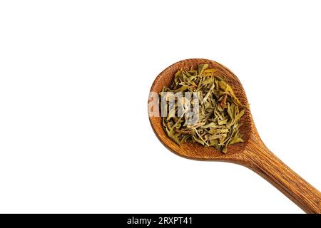Dried rue leaves in the spoon - Ruta graveolens Stock Photo - Alamy