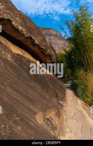 Tall strange shape mountains in Wuyishan, China. Sunset picture with ...