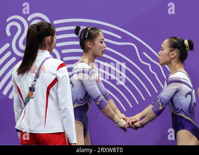 China's Zuo Tong and China's Zhang Jin at right, cheer each other on ...