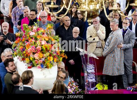 AMSTERDAM - Erwin Olaf's coffin is carried into the Westerkerk prior to ...