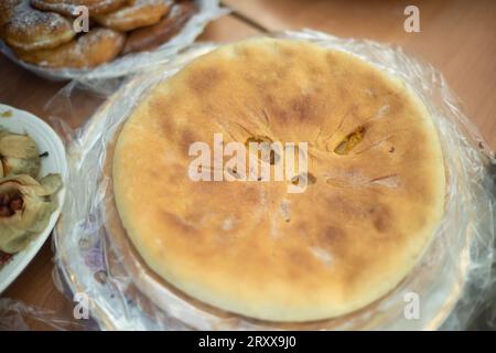 Sweet pastries. Apple pie at village fair. Traditional flour pastries ...