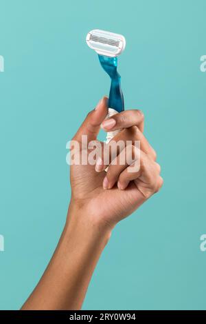 Hair Removal. Unrecognizable Black Woman Shaving Her Armpit With Pink ...