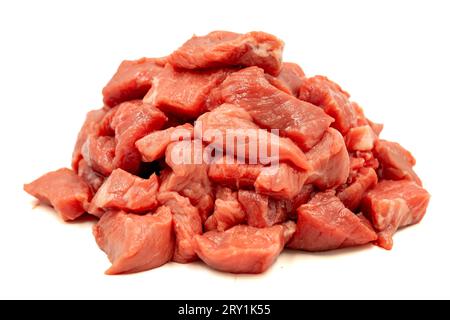 Veal cubed meat isolated on white background. Raw beef cubed with herbs ...