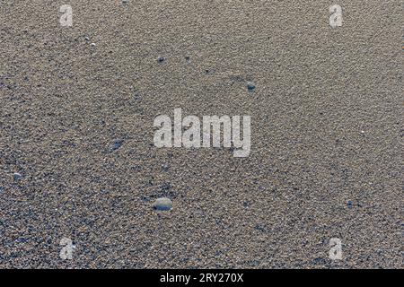 The natural texture of the sand on a Sicilian beach, Italy Stock Photo ...