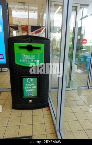 Recycling soft plastics bin at entrance to Aldi Stratford UK Stock ...
