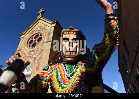 A reveler dressed as Boteiro seen during the Botargas and Mascaradas ...