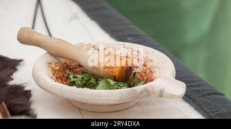 Mortarium or roman mortar with food. Ancient roman gastronomy concept ...