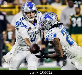 Detroit Lions running back Jahmyr Gibbs (0) runs the ball during an NFL ...