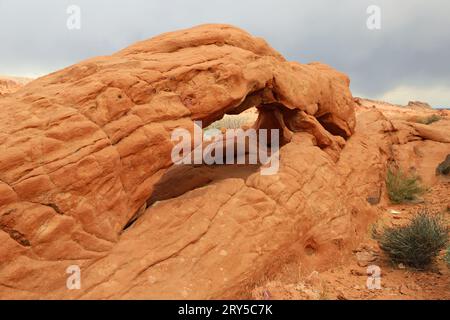 Kissing snake arch, Nevada Stock Photo - Alamy
