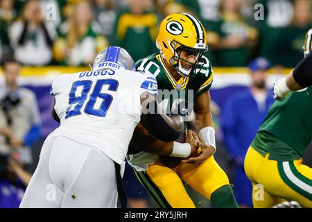 Detroit Lions defensive end Isaiah Buggs, left, and Tampa Bay ...
