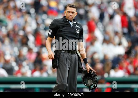 Home plate umpire Emil Jimenez, left, chats with Texas Rangers starting ...