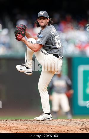 Washington Nationals pitcher Kyle Finnegan, right, celebrates with ...