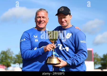 Surrey head coach Gareth Batty poses with the division one trophy after ...