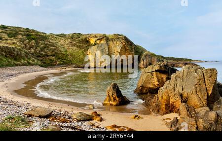 Hopeman Moray Coast Scotland a cove with sandy beach and cliffs and ...