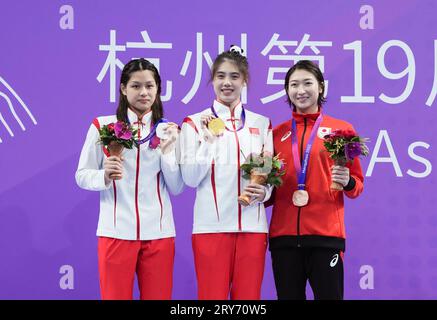 Gold medalist Yu Yiting of China celebrates during the victory ceremony ...