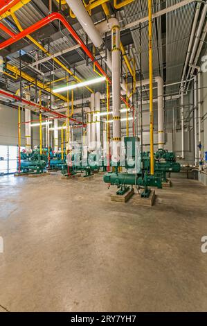 Compressor room in ammonia-cycle industrial refrigeration cold-storage ...