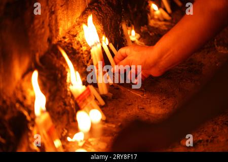Hamdaniya, Iraq. 29th Sep, 2023. People light candles outside St Mary ...